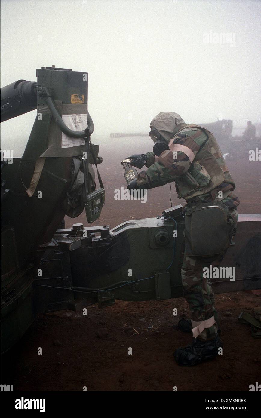 In Mission-Oriented Protective Posture response level 4 (MOPP-4) gear ...