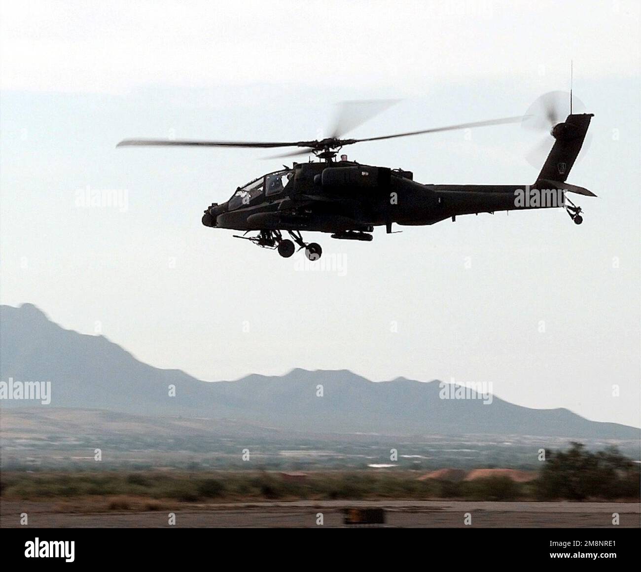 A U.S. Army AH-64 Apache attack helicopter taxis out of Biggs Army Air ...