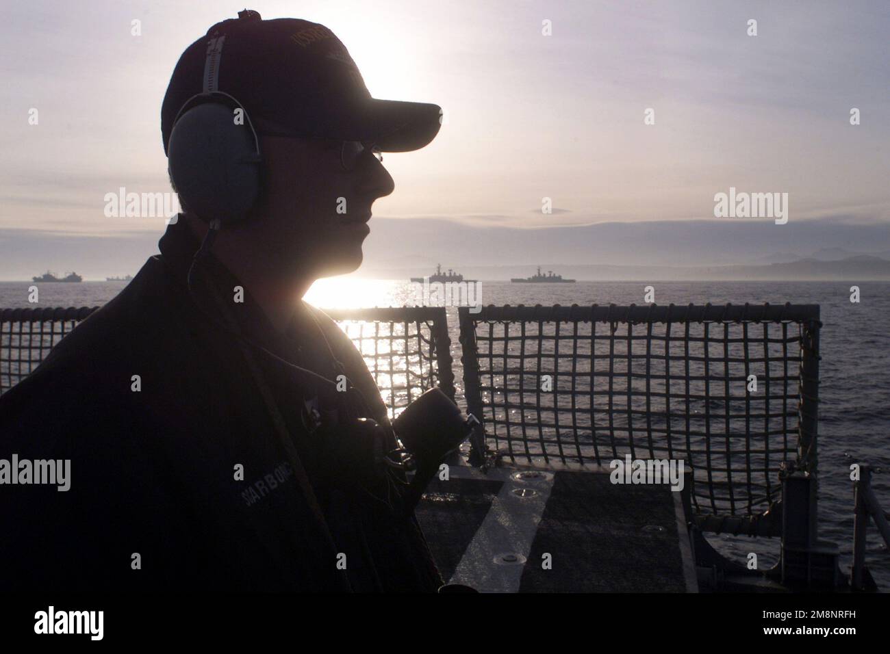 US Navy SEAMAN Josh Scarborough stands the aft lookout watch aboard USS ...