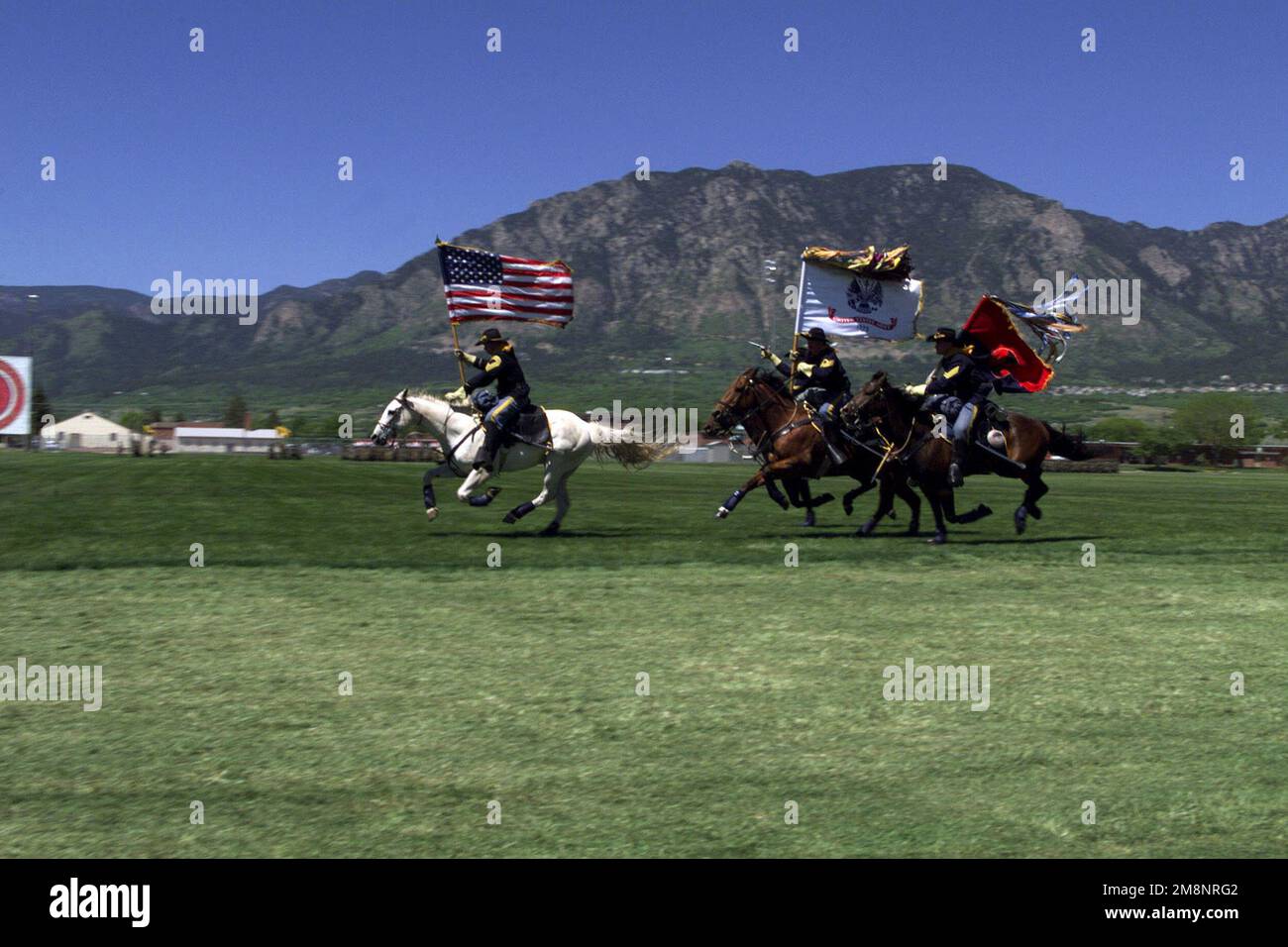 Left side profile, medium shot of four members of the Fort Carson Color ...