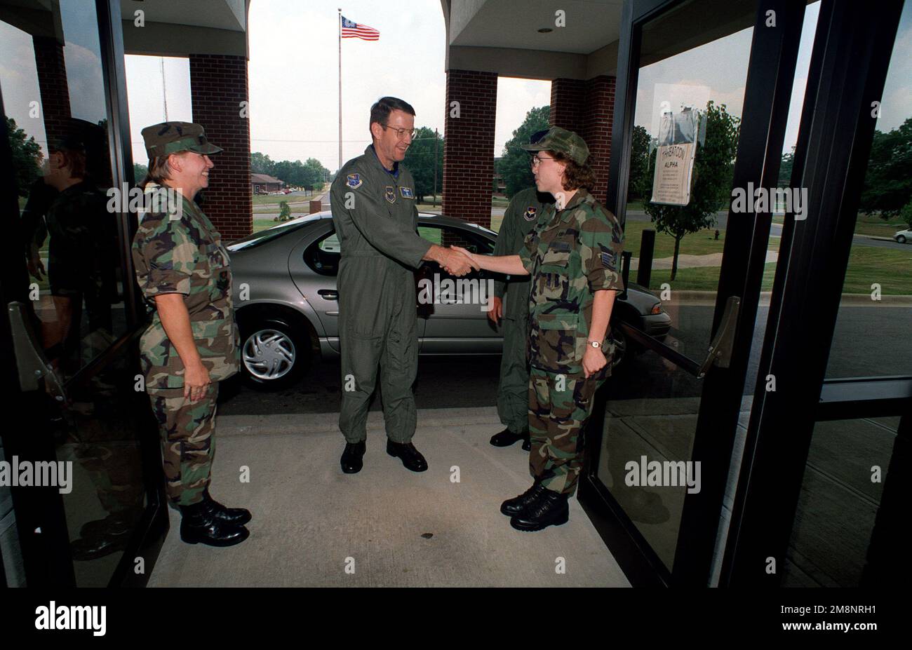 General Robertson, Air Mobility Command (AMC) Commander is greeted by ...