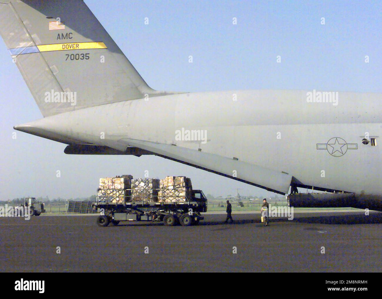 A K-Loader carries a load of pallets to upload onto a C-5 Galaxy at RAF ...