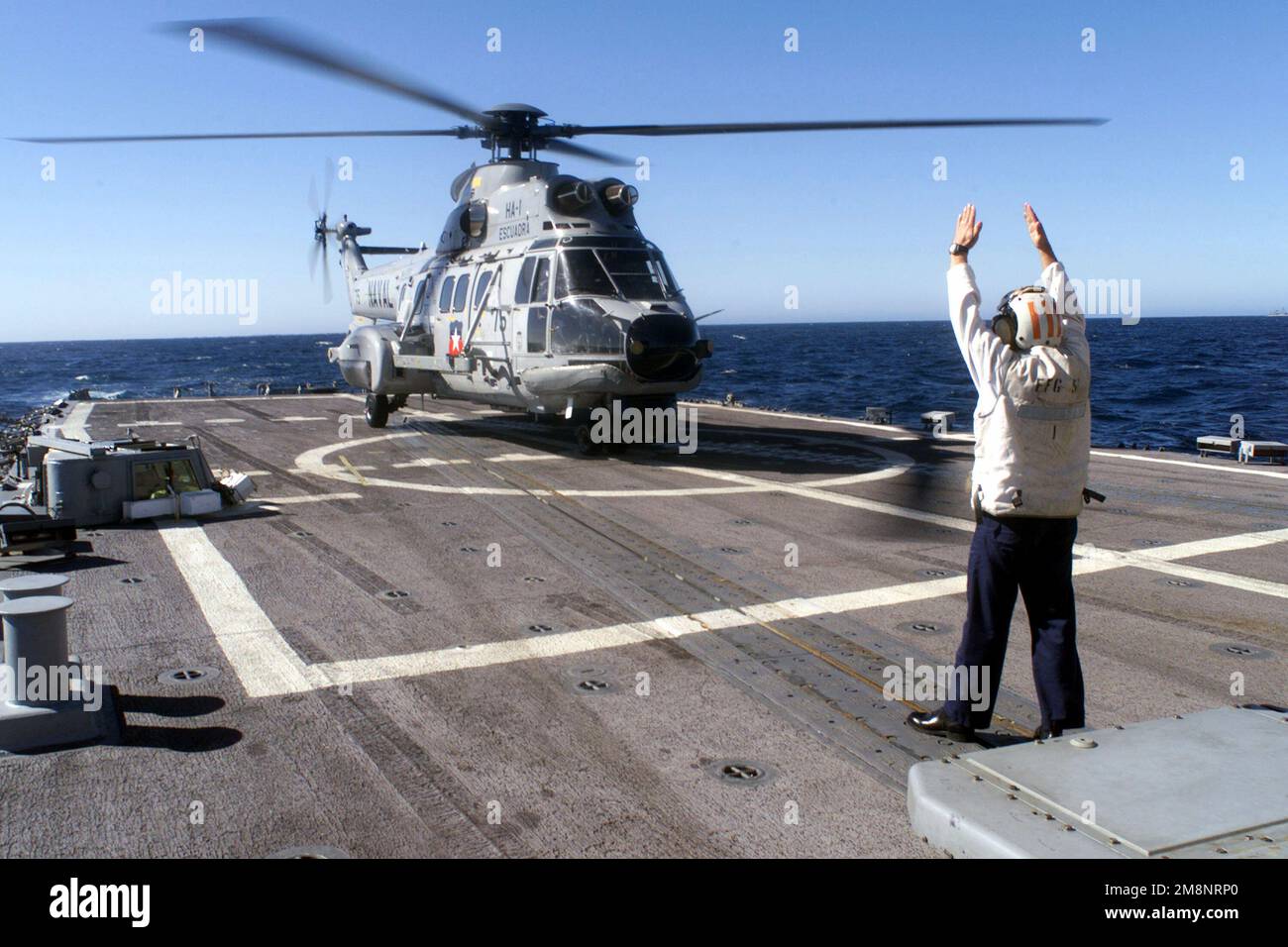 US Navy CHIEF Boatswain's Mate Karl Kubasa directs a Chilean Naval Air ...