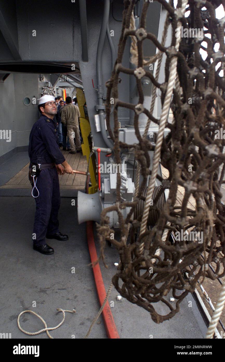 A Chilean sailor aboard the flagship BLANCO ENCALADA (DLH 15) prepares ...