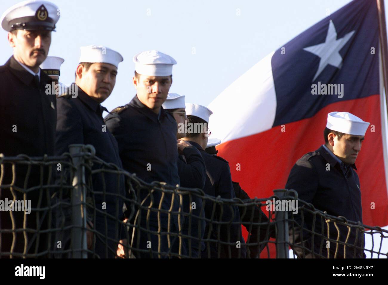 Chilean sailors aboard the flagship BLANCO ENCALADA (DLH 15) observe ...