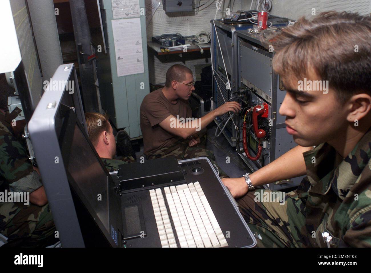 US Navy Electronics Technician 3rd Class James Kyne (right) and US Navy ...
