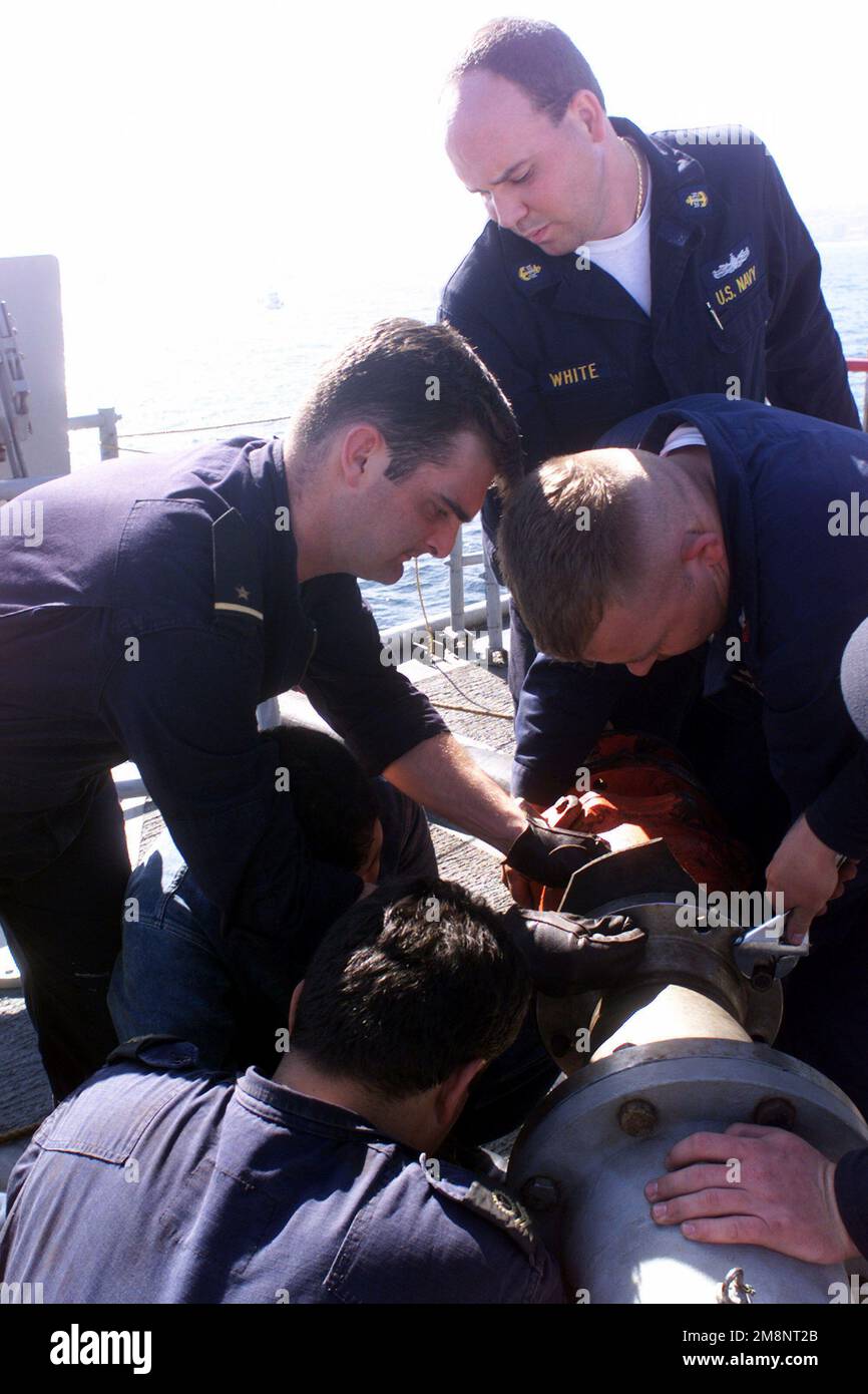 US Navy CHIEF Gas Turbine Systems Technician James White, (top) and US ...