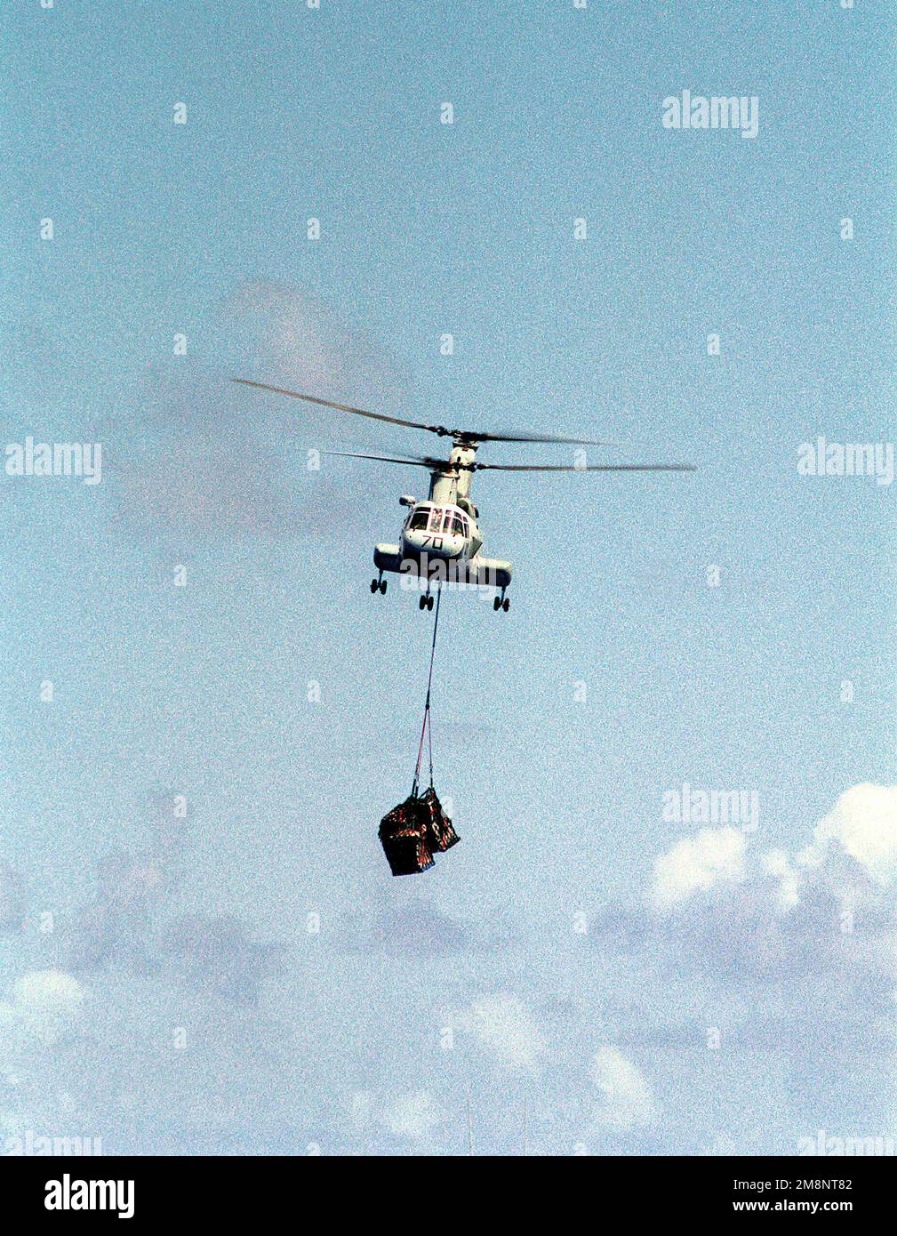 A CH-46D Sea Knight helicopter from Helicopter Combat Support Squadron ...