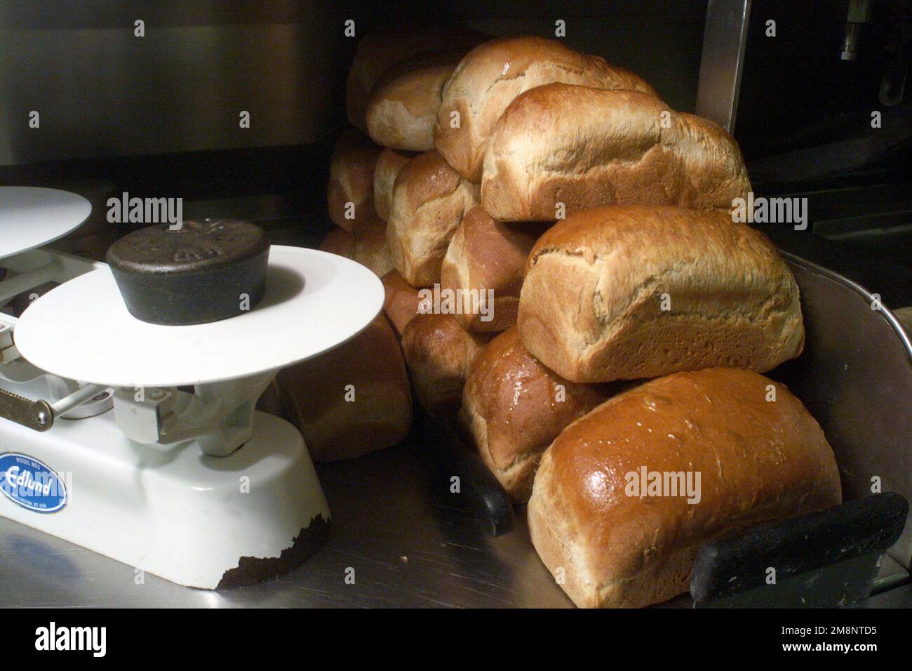 US Navy Mess SPECIALIST 3rd Class Justin Gay makes fresh bread almost ...