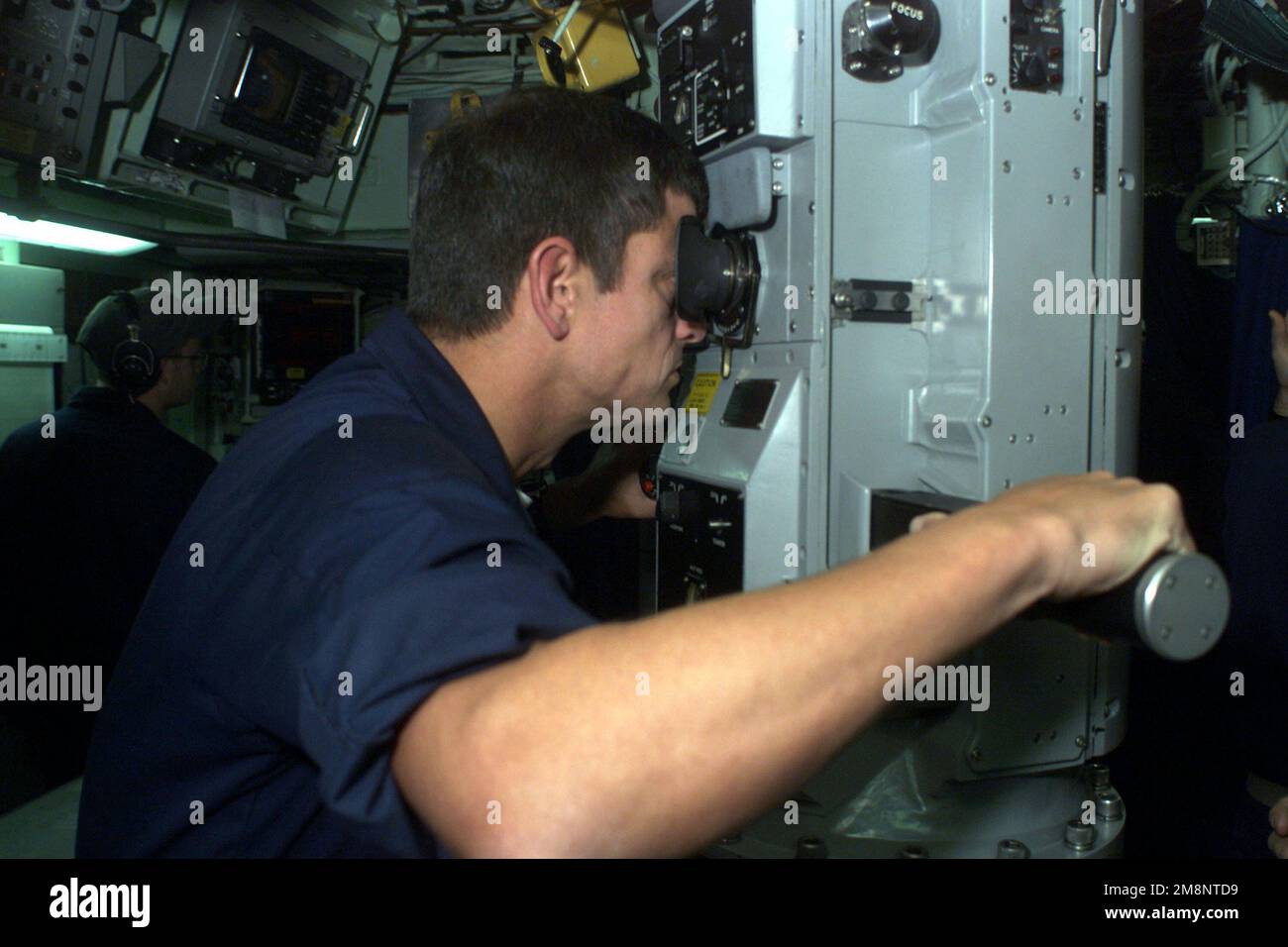 US Navy Commander Dennis Murphy, Commanding Officer of the fast attack ...