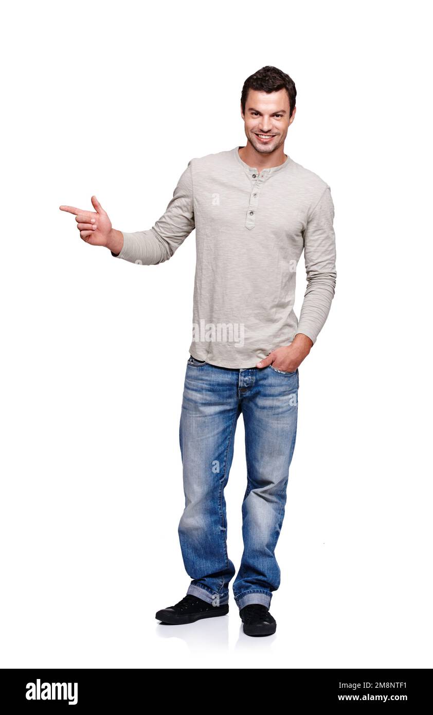 Portrait, pointing and mockup with a man model in studio isolated on a ...