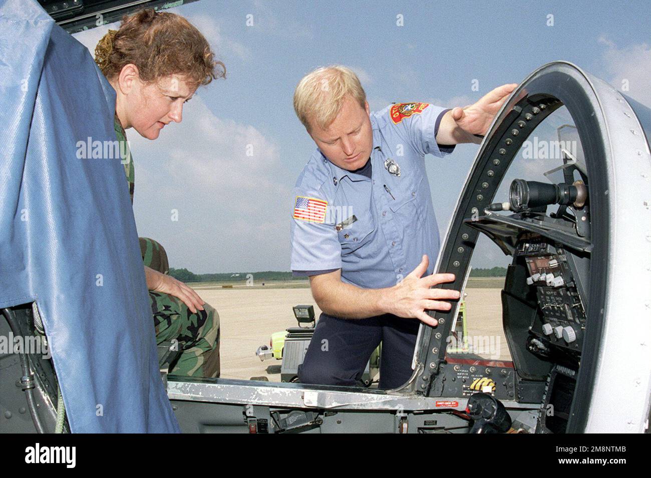 A member of the Otis Air National Guard Base Fire/Rescue Department ...