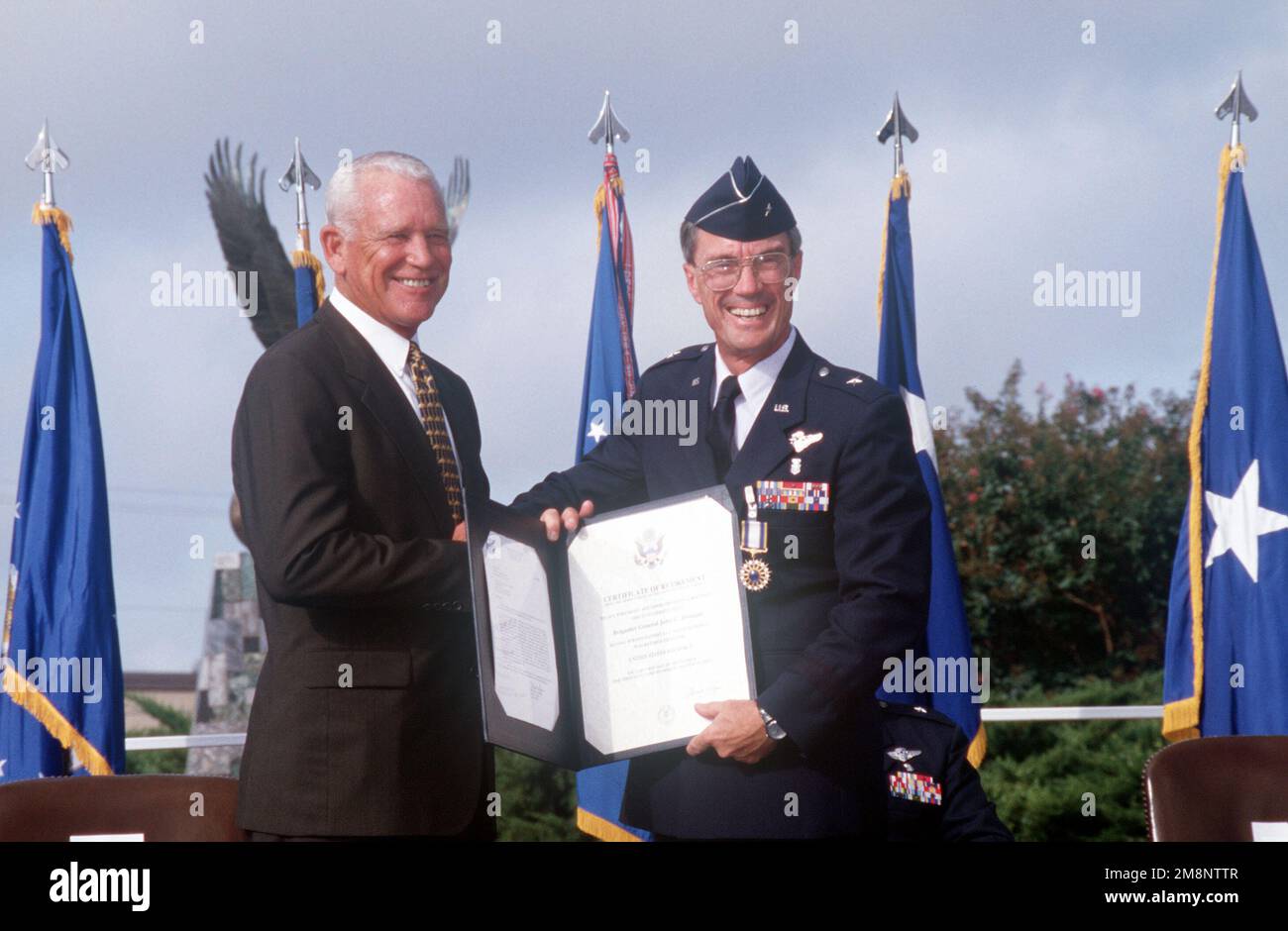 Retired General Robert Rutherford (left) presents Brigadier General ...