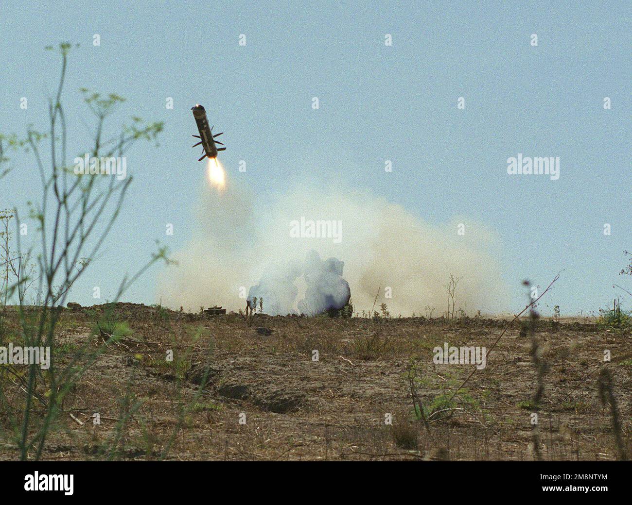Medium shot looking up from a low angle as Marine CPL J. Dillion ...