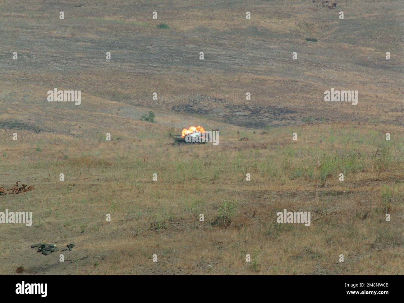 Left side profile long shot of a javelin impact on an USMC M60 tank ...