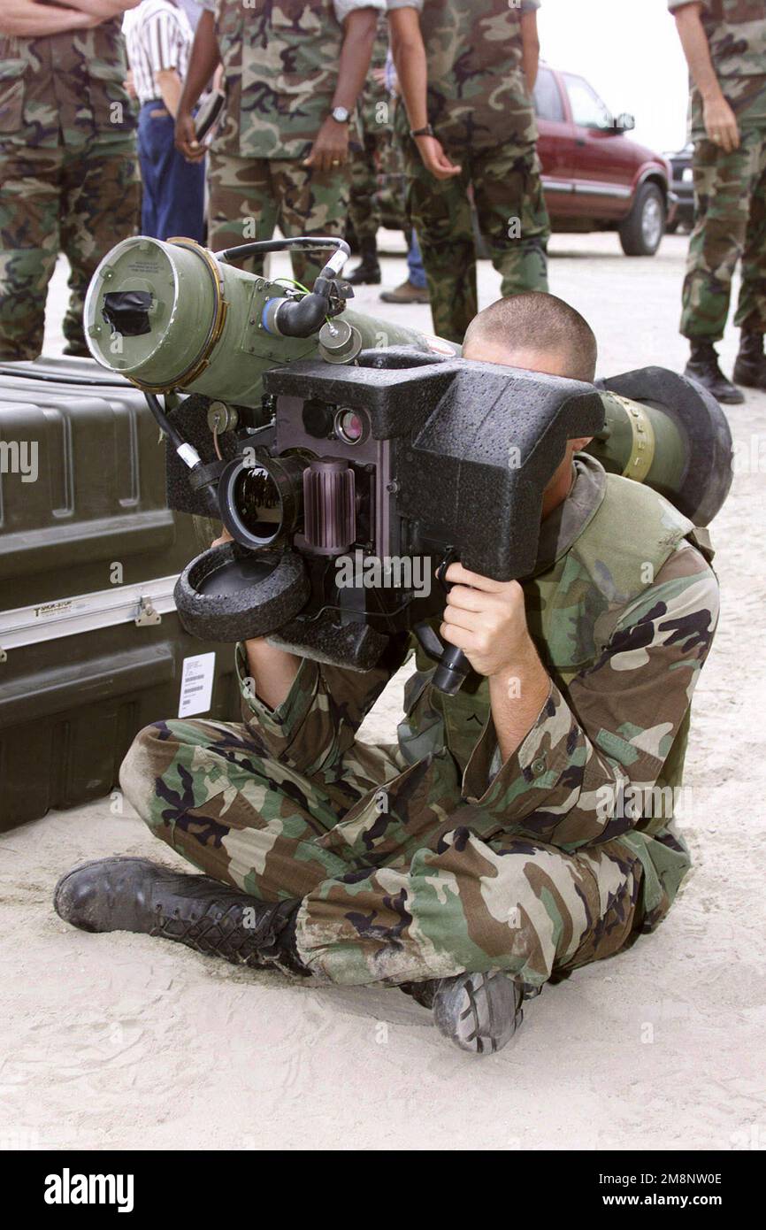 Marine PFC A. Powell from 3rd Battalion, 1ST Marines demonstrates one ...