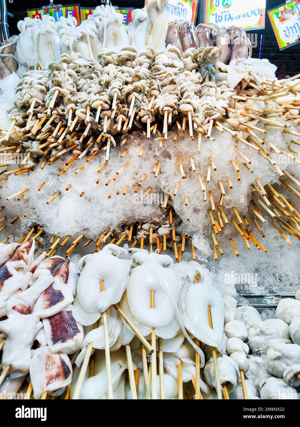 Bangkok food market, marine street food ,featuring a large stack of ...