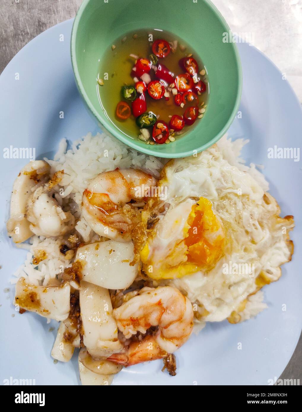 Street food of shrimp and squid meat,a dish typical on the streets of ...
