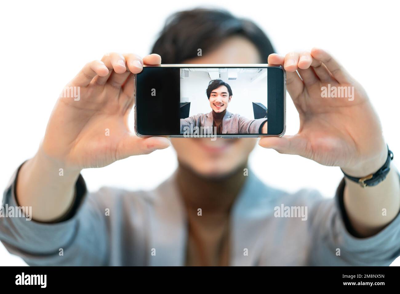 Take the young man Stock Photo - Alamy