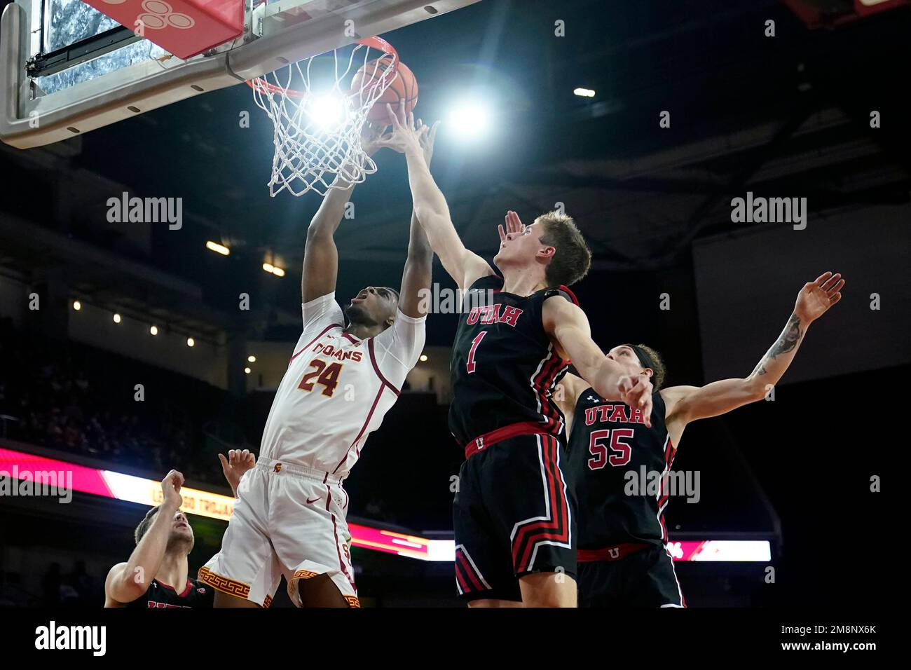 Southern California forward Joshua Morgan (24) scores past Utah forward ...