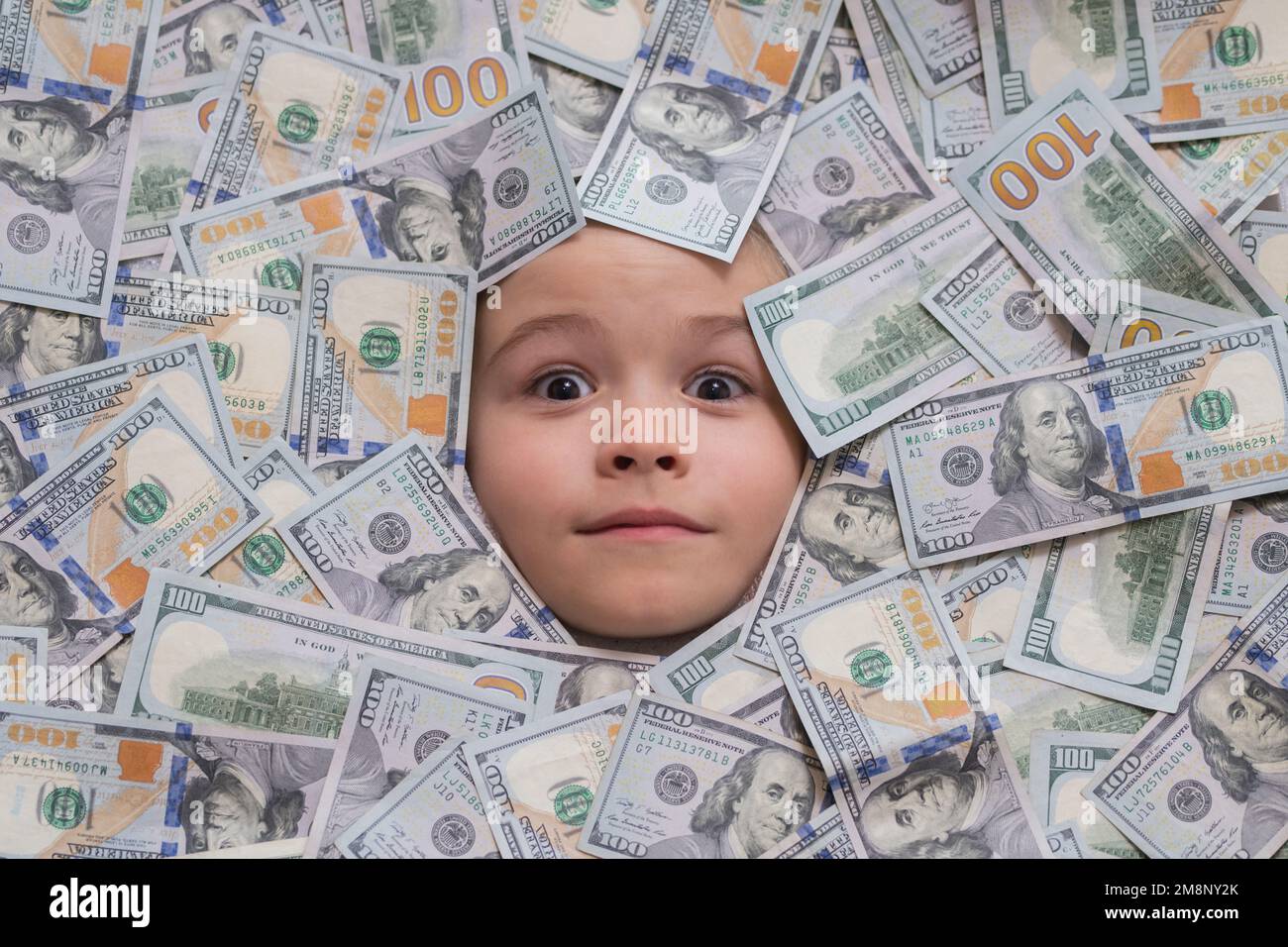Money banknotes, cash dollars bills. American dreams. Funny kids face ...