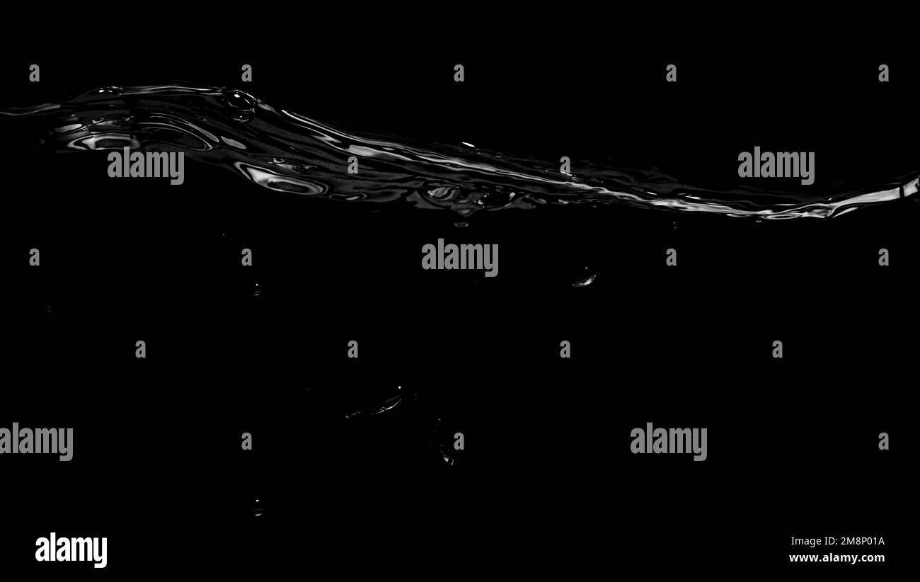 Liquid suface line between underwater and above water with black ...