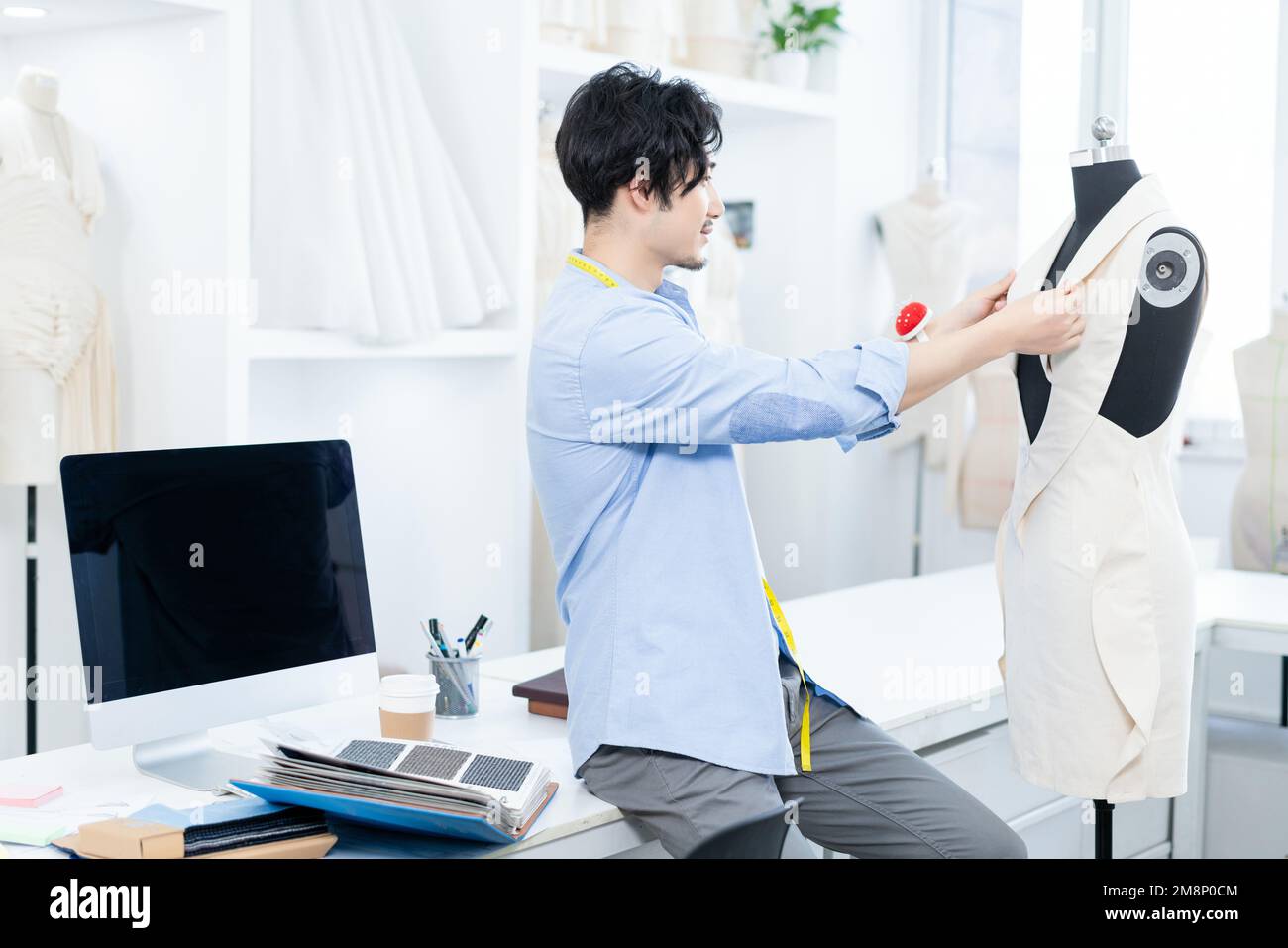 Young male clothing designer Stock Photo - Alamy