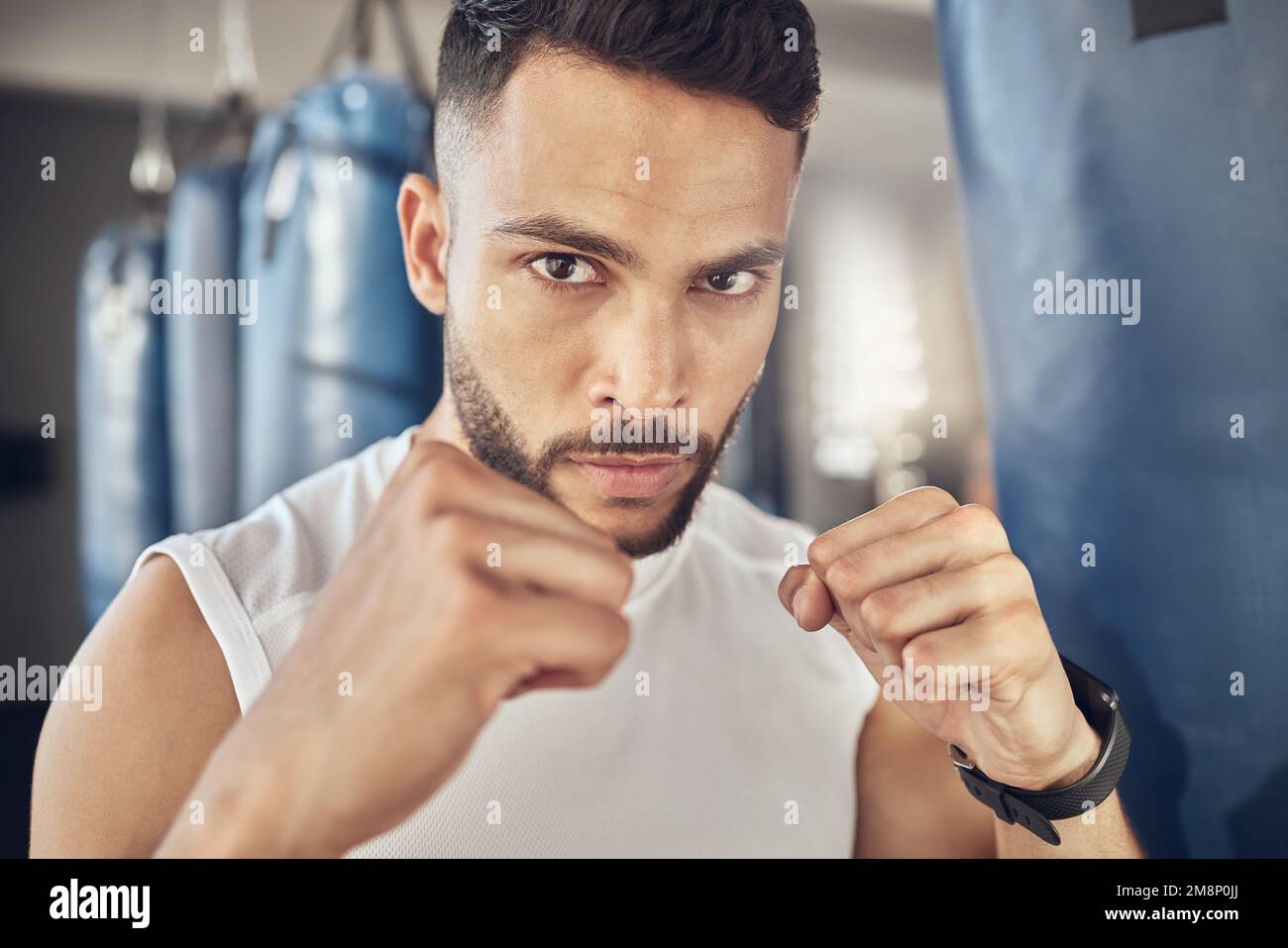 Closeup on face of boxer ready to punch. Portrait of mma fighter ready ...