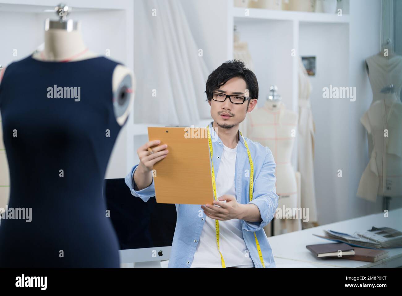 Young male clothing designer Stock Photo - Alamy