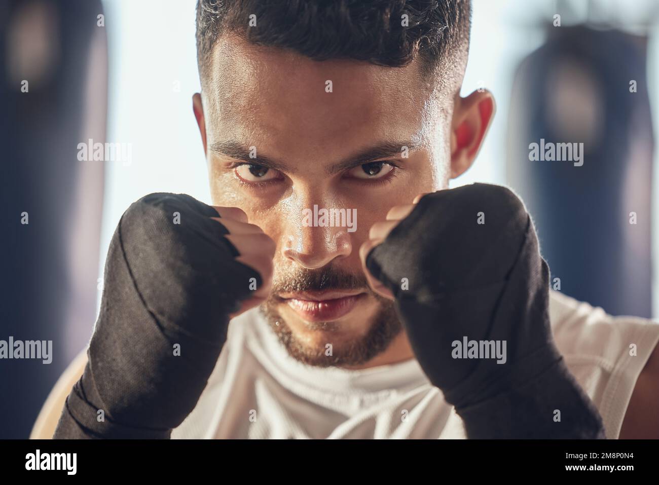 Closeup on face of boxer ready to punch. Strong mma fighter ready for ...