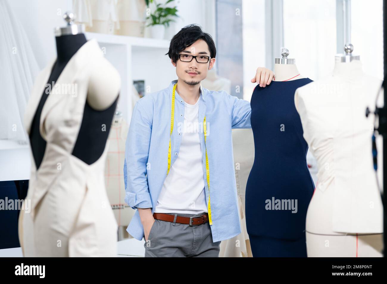 Chinese male model in black hi-res stock photography and images - Alamy