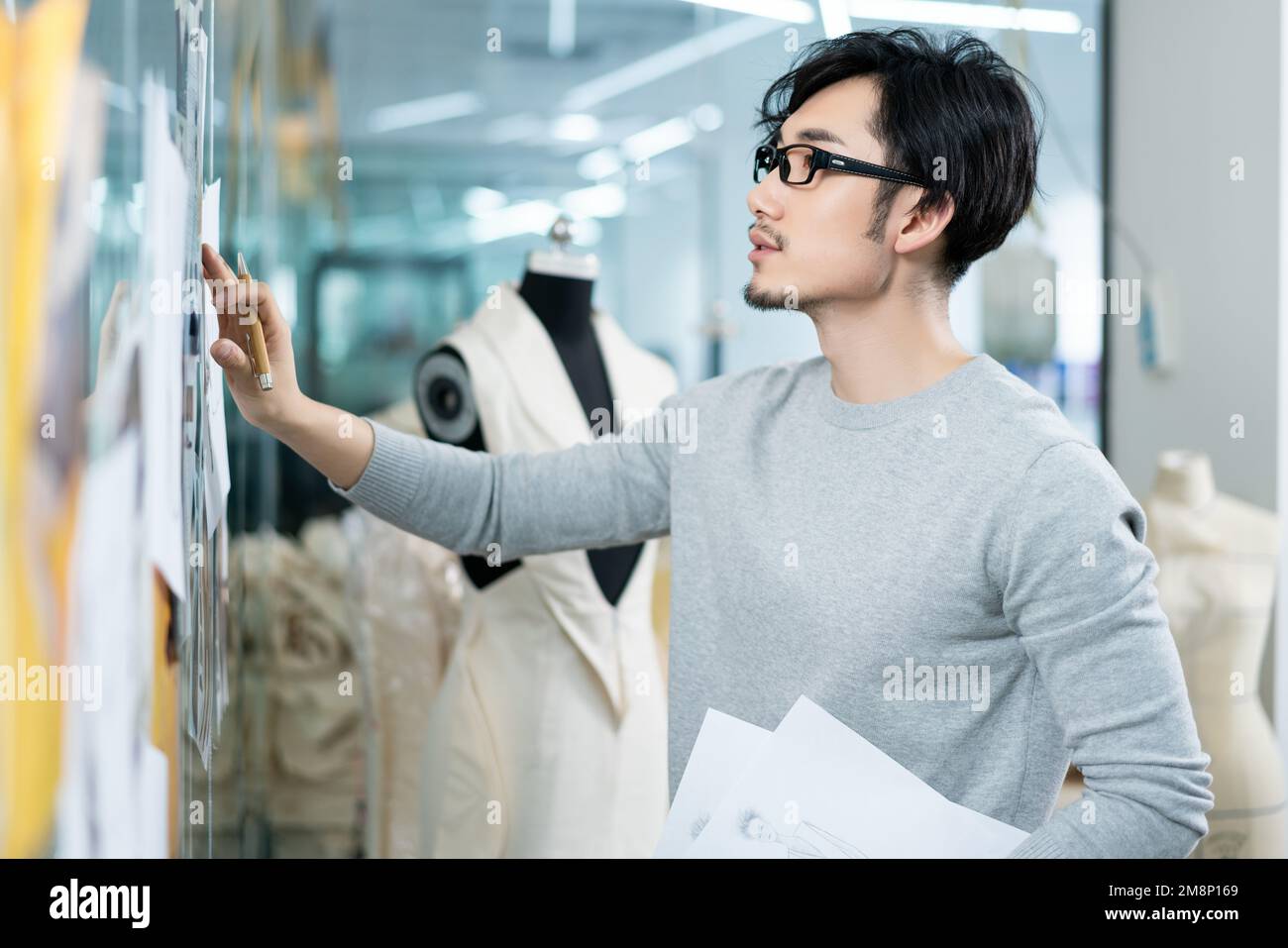 Young male clothing designer Stock Photo - Alamy
