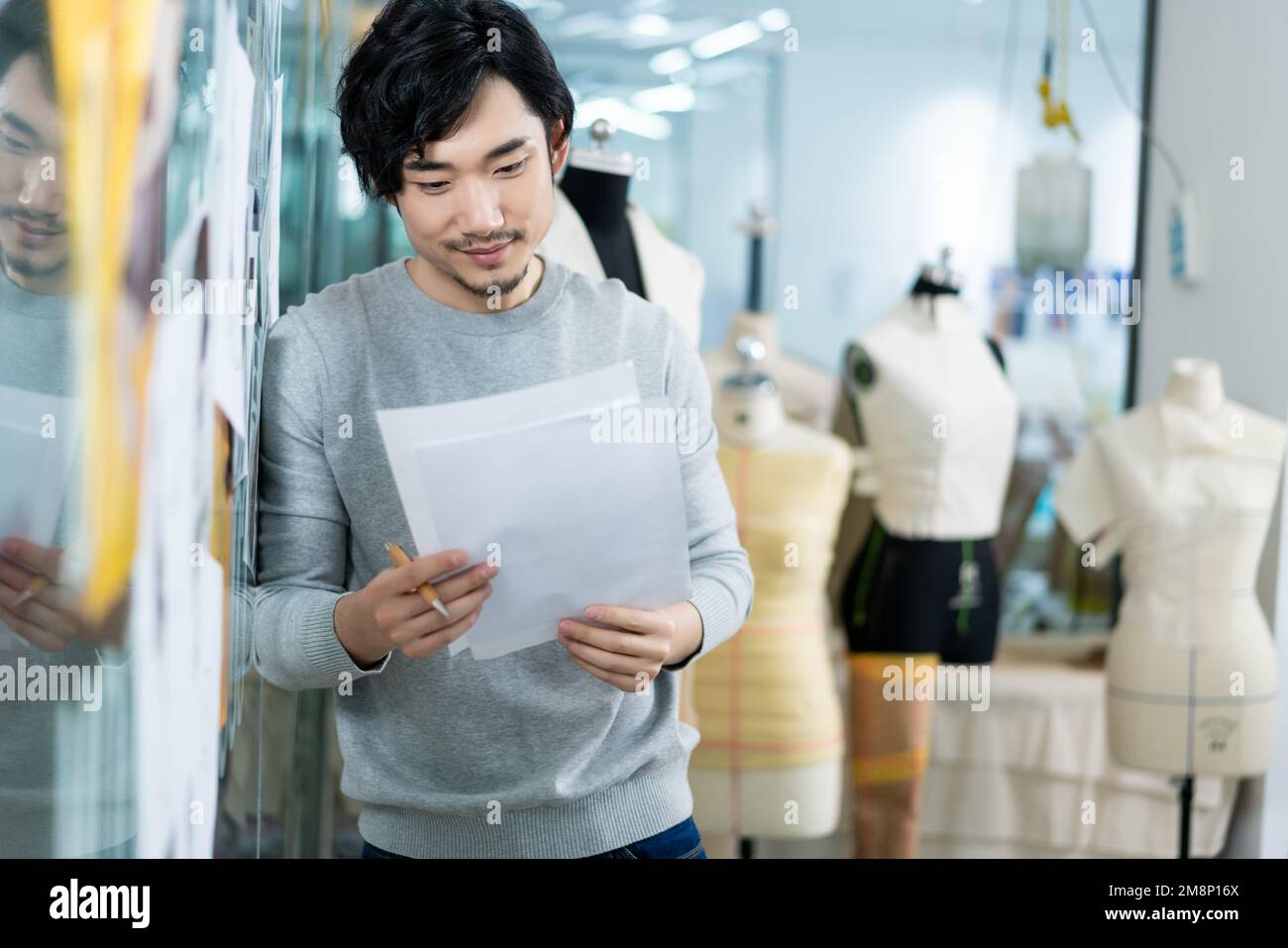 Young male clothing designer Stock Photo - Alamy