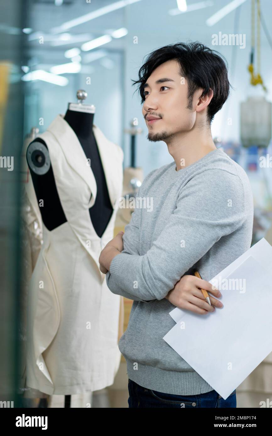Young male clothing designer Stock Photo - Alamy