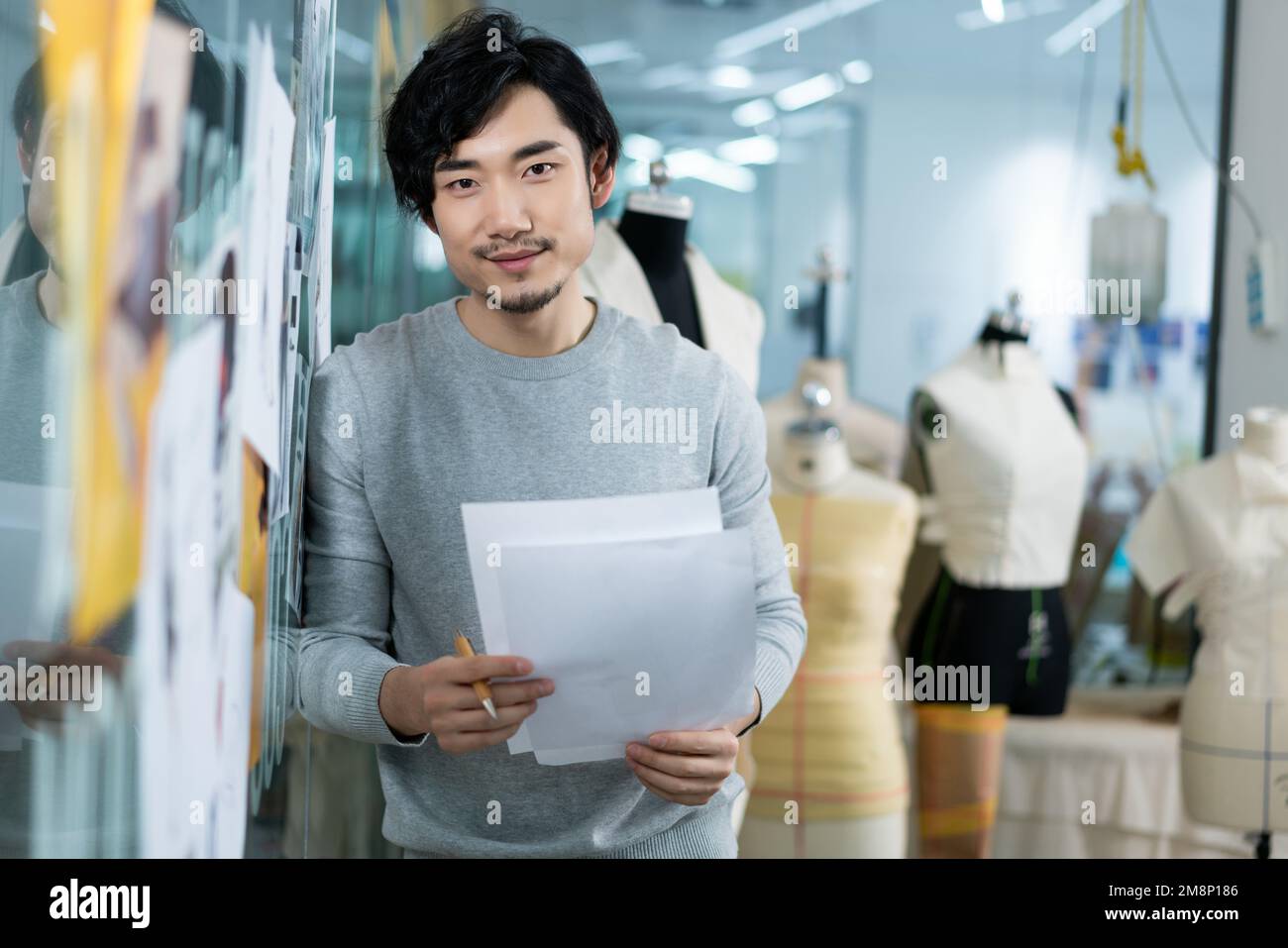 Young male clothing designer Stock Photo - Alamy