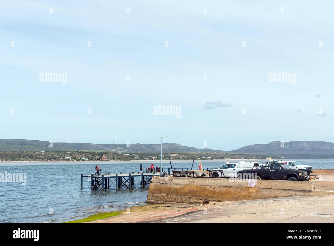 Witsand, South Africa - Sep 24, 2022: Anglers on a jetty in the Breede ...