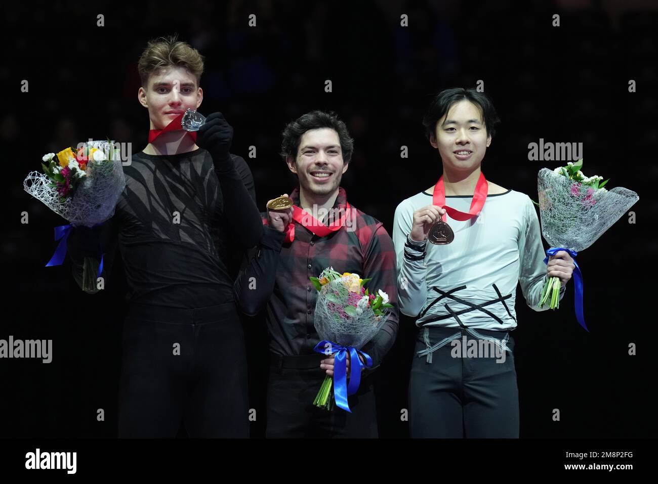 Gold winning Keegan Messing, centre, silver winner Conrad Orzel, left ...
