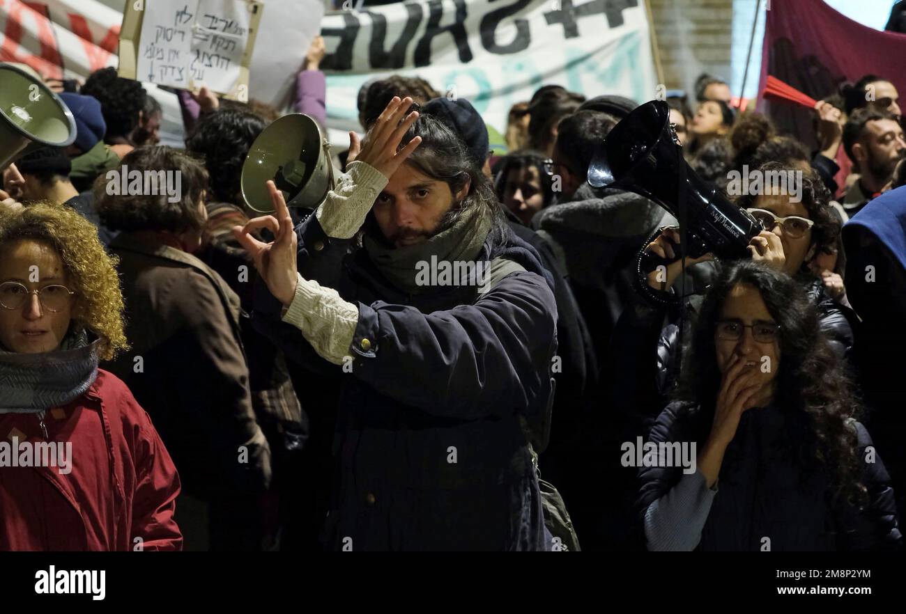 JERUSALEM, ISRAEL - JANUARY 14: A Left wing activist makes hand gesture ...