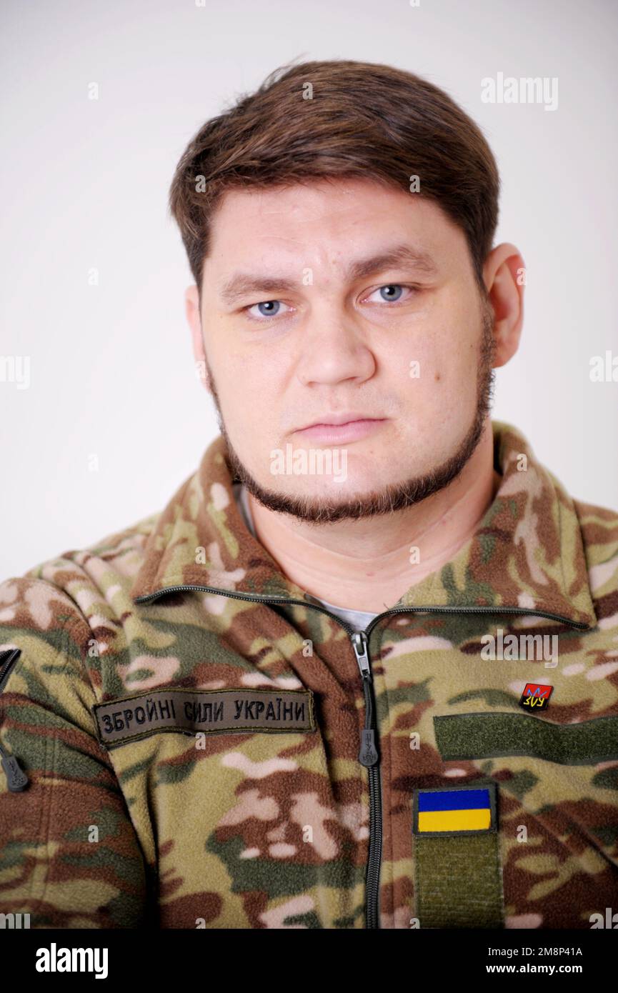 Ukrainian defender. soldier Armed Forces of Ukraine. A close-up photo ...