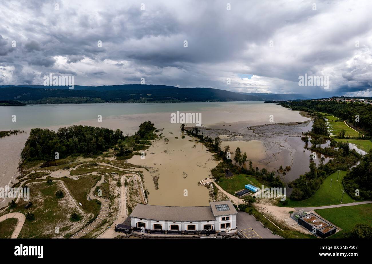 An aerial view of the Lake Biel Bienne during the flood on a cloudy day ...