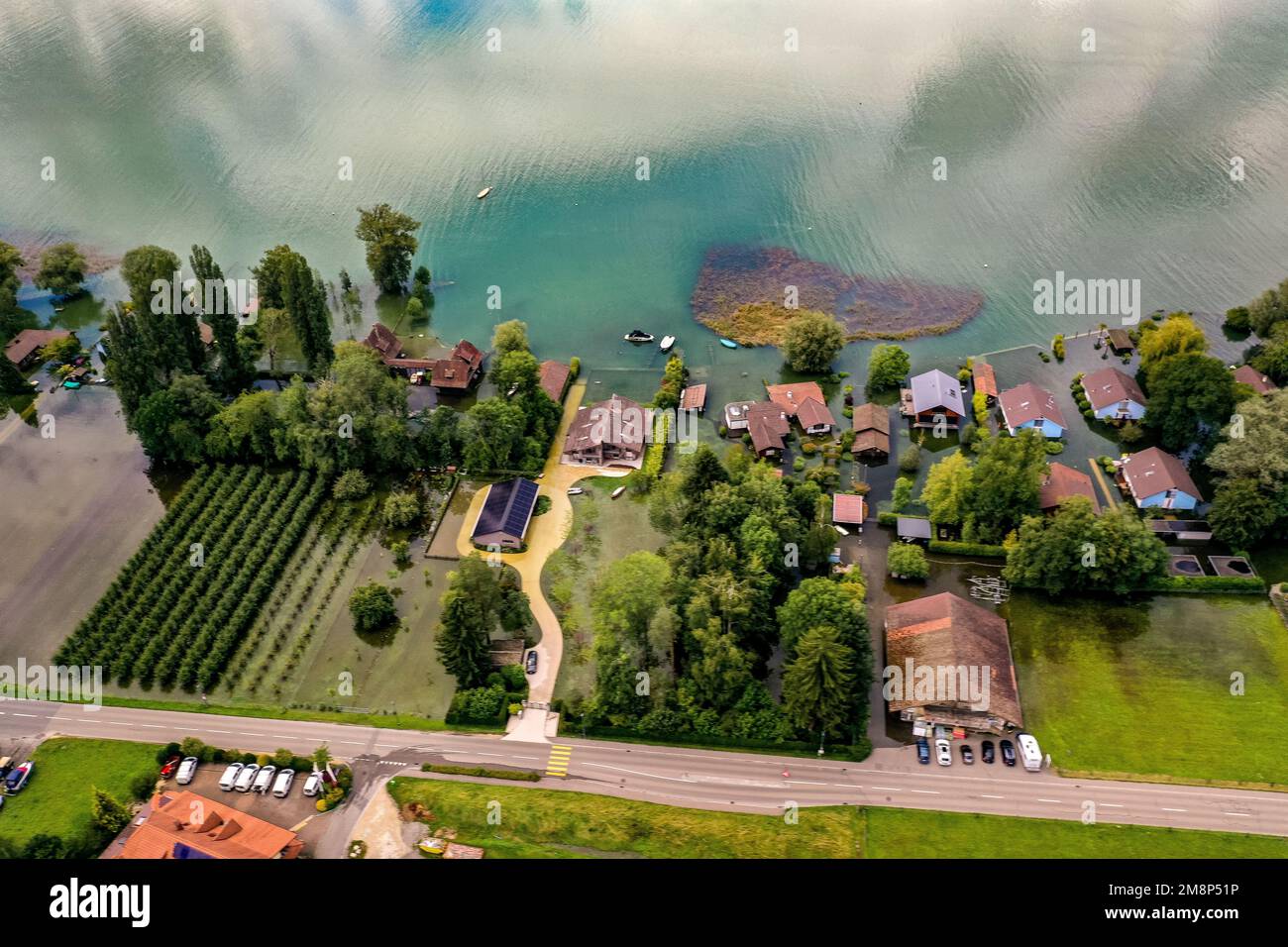 A drone shot of the houses on the lake Biel during the flood in ...