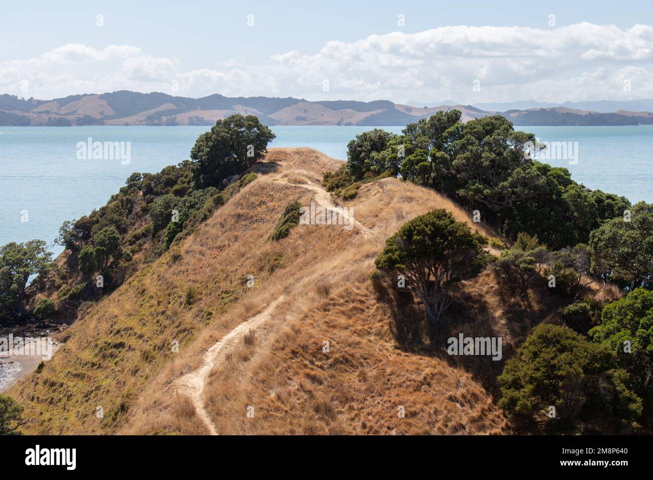 The view of picturesque landscape with hiking trail, dry grass slope ...