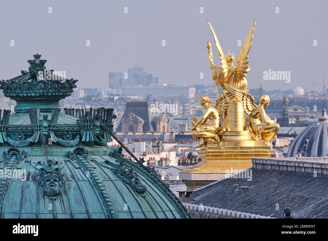 Paris, France - May, 2022: View of Paris cityscape with golden statue ...