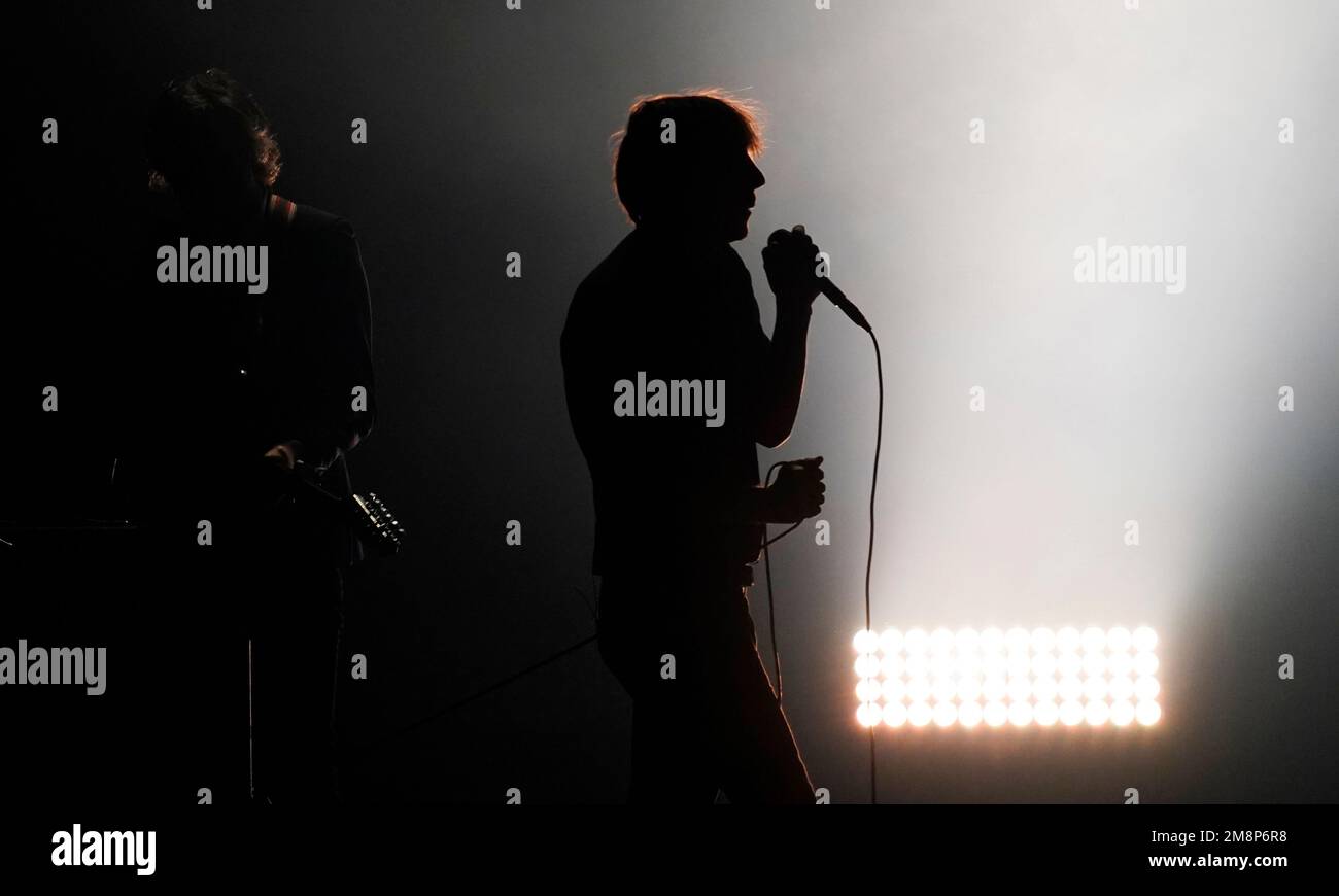 Thomas Mars of the band Phoenix performs in silhouette during ...