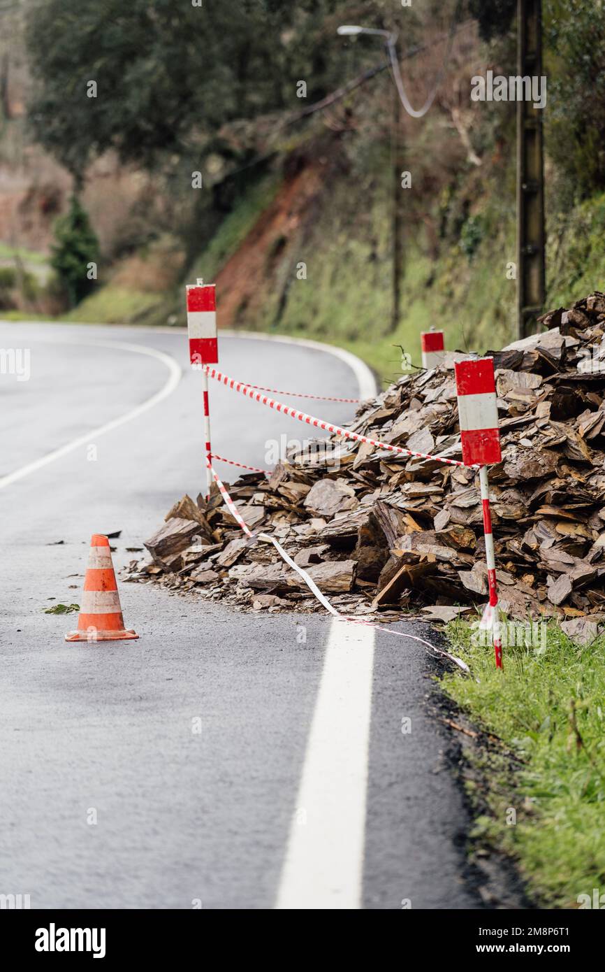 Rocks blocking the road due to a rockslide after a heavy rainfall Stock ...