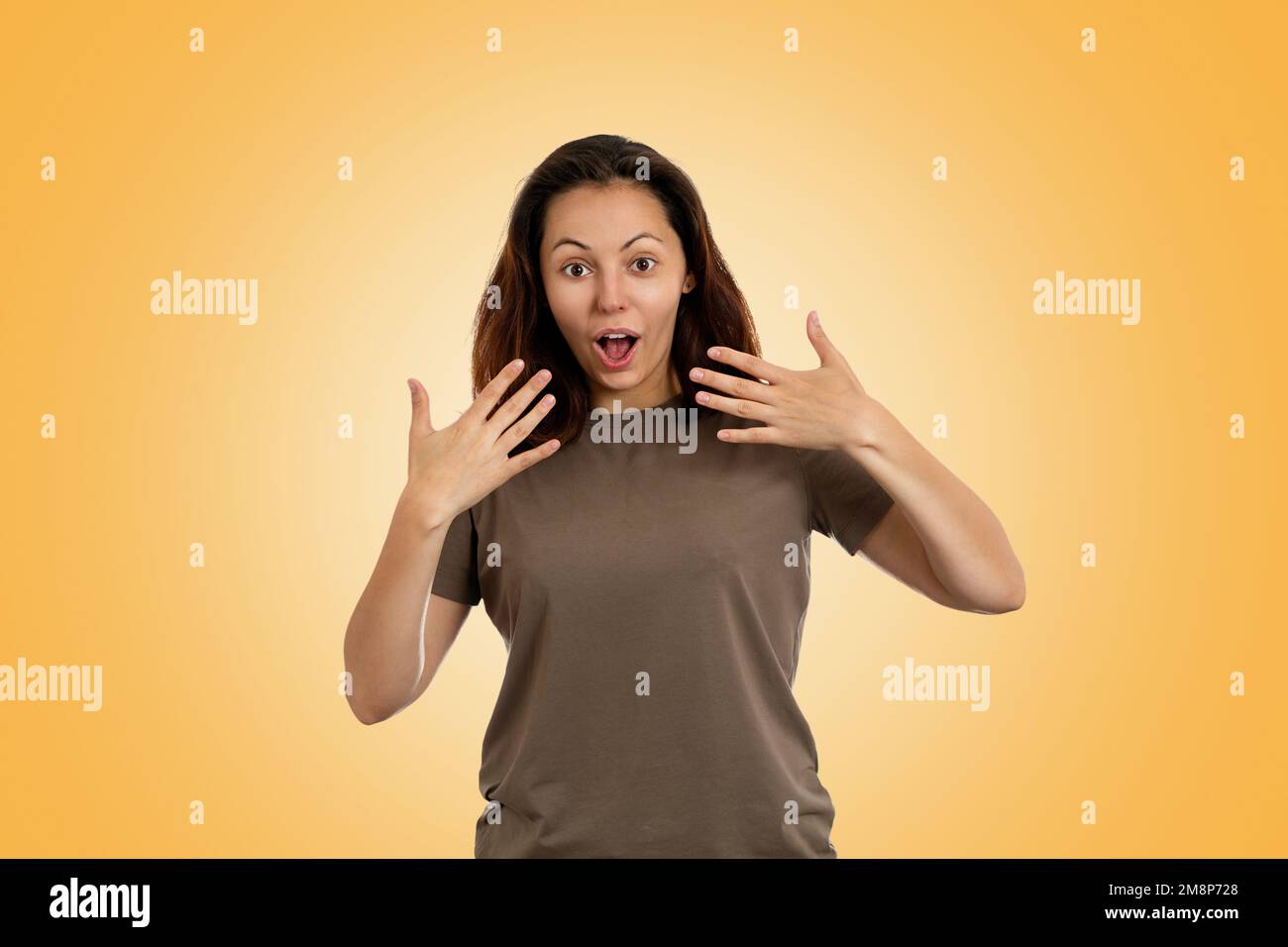 Portrait of an amazed young Caucasian woman, feeling like a winners ...