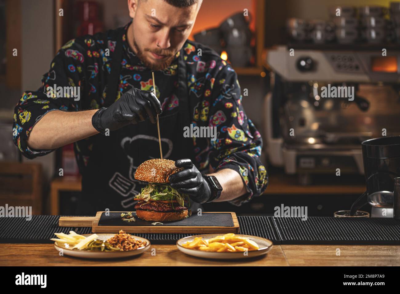 Burger with toothpick hi-res stock photography and images - Alamy