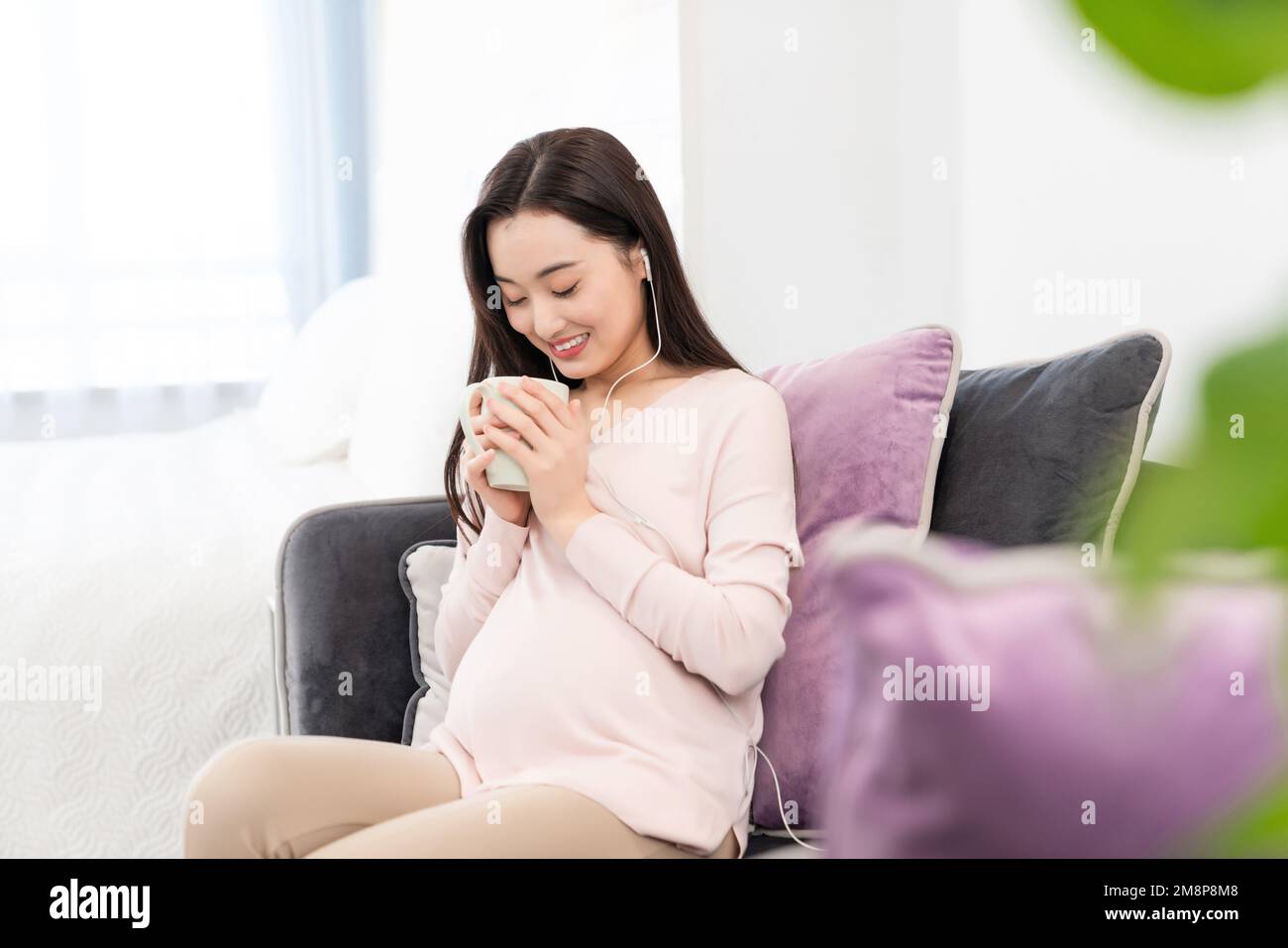 Pregnant women to family life Stock Photo - Alamy