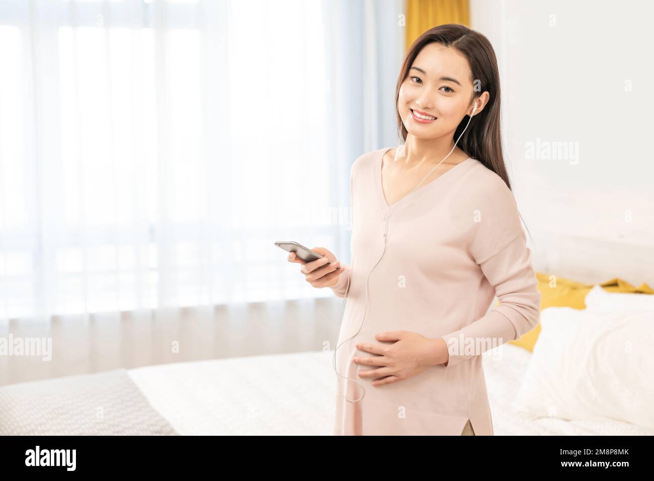 Pregnant women to family life Stock Photo - Alamy