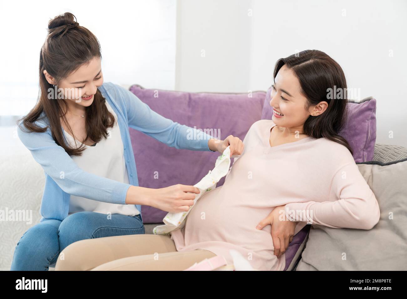 Pregnant women to family life Stock Photo - Alamy